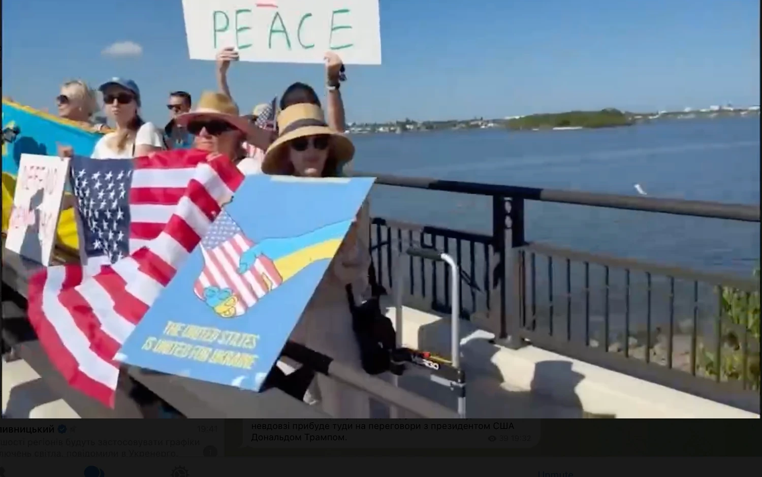 Activists with Ukrainian flags gathered on the bridge to Mar-a-Lago ...